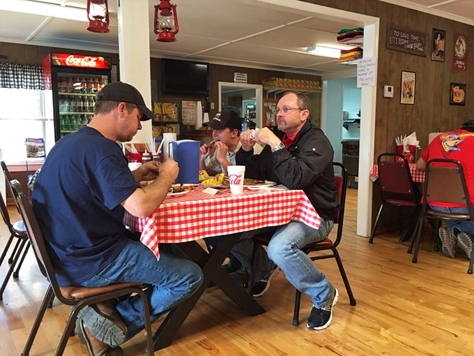 Real barbecue brings people together. No phones necessary when there's smoked meat and good conversation on the table.