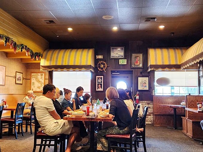 Where strangers become friends over plates of pasta. The yellow-striped awnings inside create the feeling of dining al fresco while safely indoors.