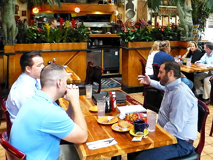 The dining room hums with conversation and clinking glasses&mdash;a community gathering place where Sacramento's diverse population breaks bread together.