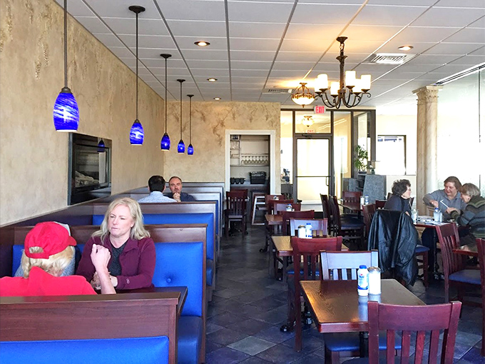 Blue pendant lights cast a Mediterranean glow over happy diners. The cozy booths invite you to settle in and forget you're in Pennsylvania.