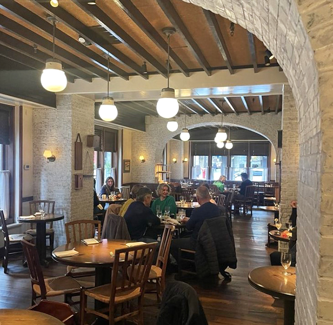 The dining room buzzes with conversation and clinking glasses &ndash; the universal soundtrack of people having a genuinely good time.