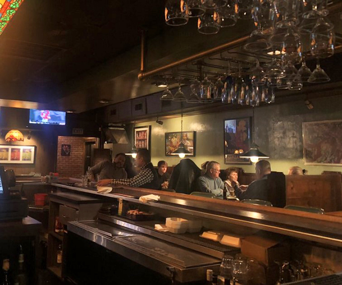 The bar area buzzes with conversation as patrons gather for what locals know is one of Dayton's most reliable dining experiences.
