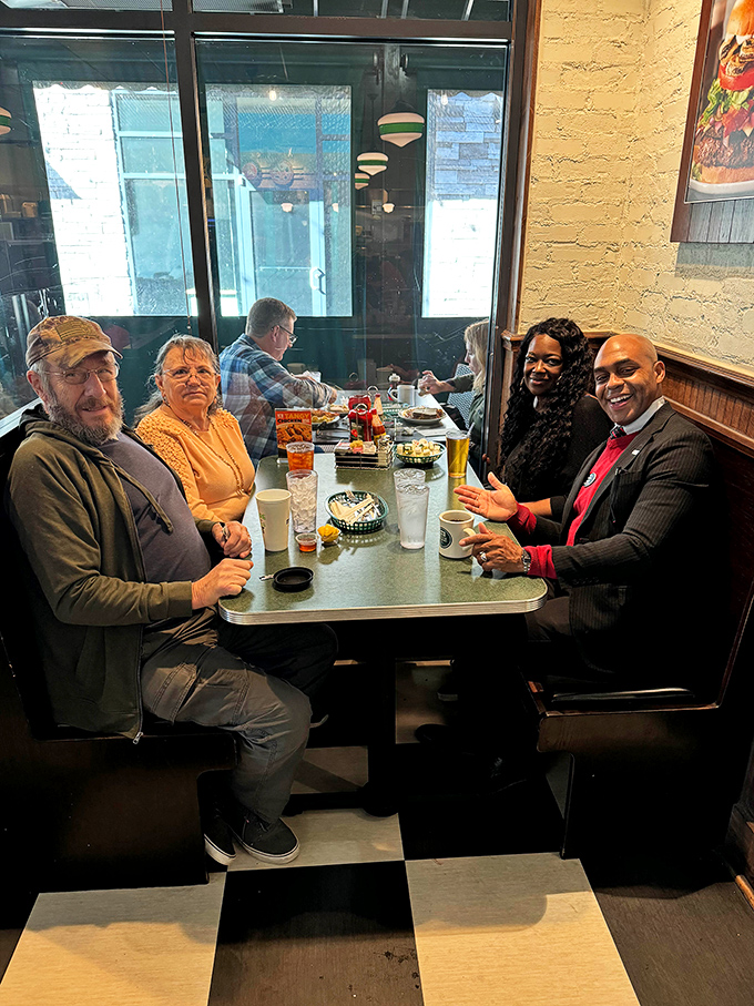 Where strangers become friends over shared food recommendations. The true magic of diners happens across these tables.