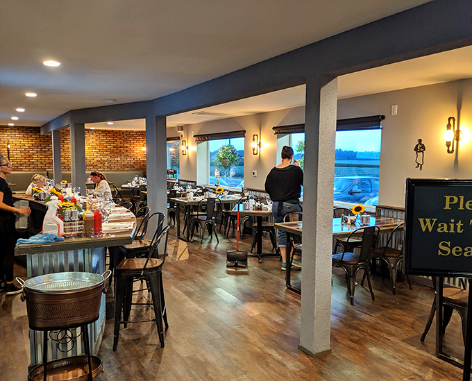 The dining room buzzes with that perfect energy of people united in pursuit of good food. Notice the absence of phones—real pleasure demands full attention.