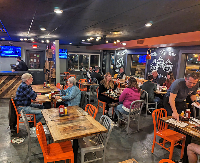 The dining room buzzes with the universal language of good food &ndash; satisfied smiles and the occasional "you've got to try this."