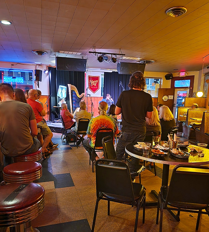 When musicians take the stage and diners gather round, Happy Dog transforms from eatery to community living room where food and culture share the spotlight.