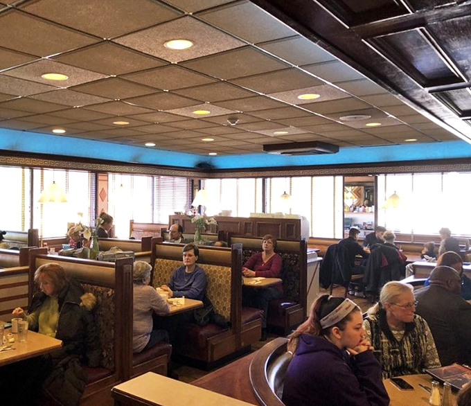 Classic booths filled with locals trading stories over plates of comfort food—the true soundtrack of any great American diner.
