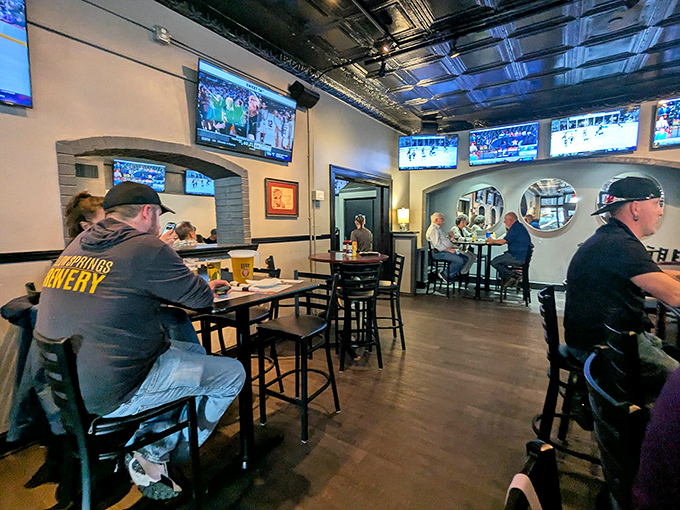 The dining area buzzes with conversation and camaraderie. Multiple screens ensure you'll never miss a play while savoring those legendary fries.