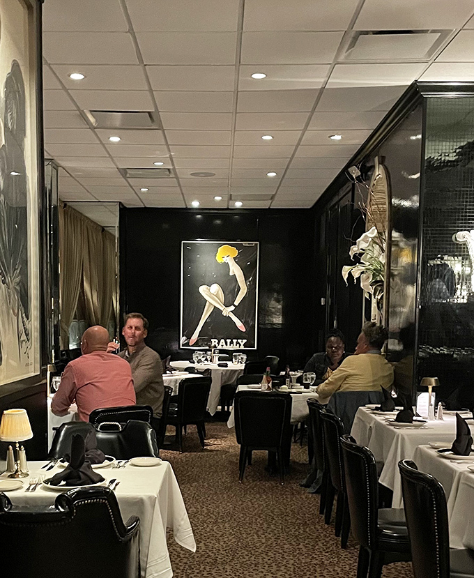 The dining room hums with conversation and anticipation. Against black walls adorned with vintage art, Baltimore's power players and celebration-seekers commune over perfect martinis.