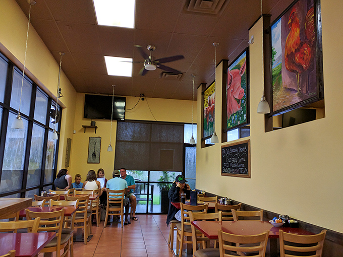 Morning light streams through windows as diners enjoy the ritual of breakfast in a space that feels like a community living room.