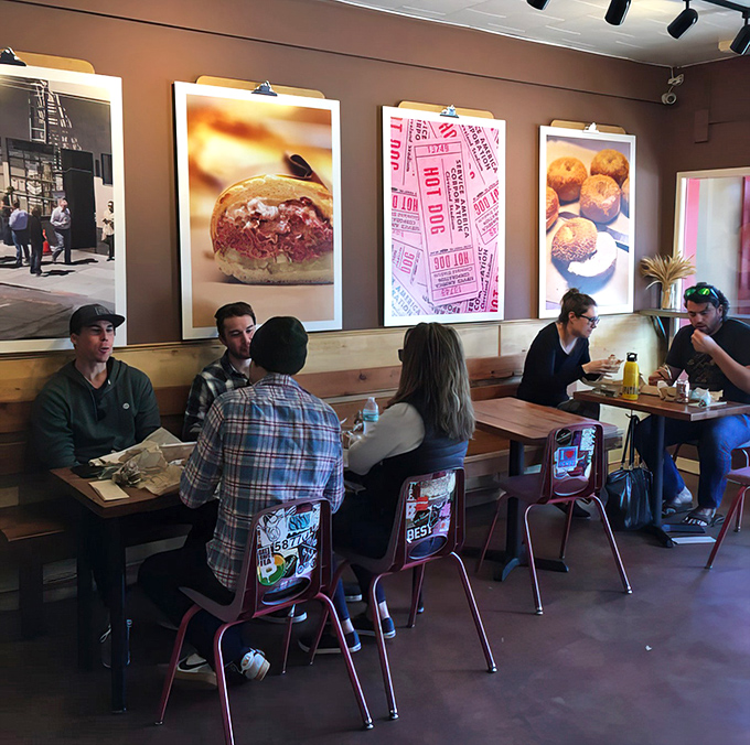 Diners contemplate their choices beneath those glorious food portraits, like art students studying the masters before creating their own.