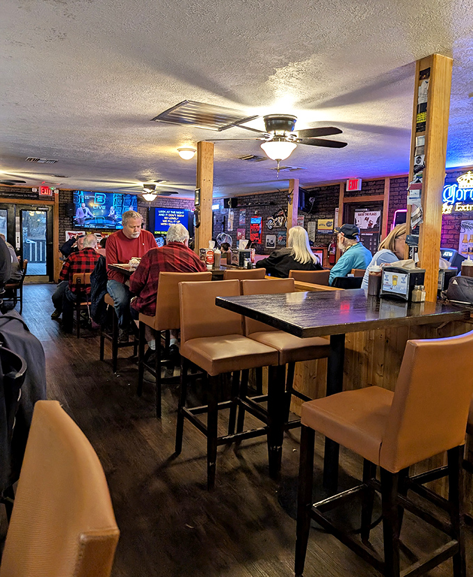 The dining area feels like your favorite uncle's den&mdash;if your uncle happened to be a barbecue wizard with excellent taste in wood paneling.
