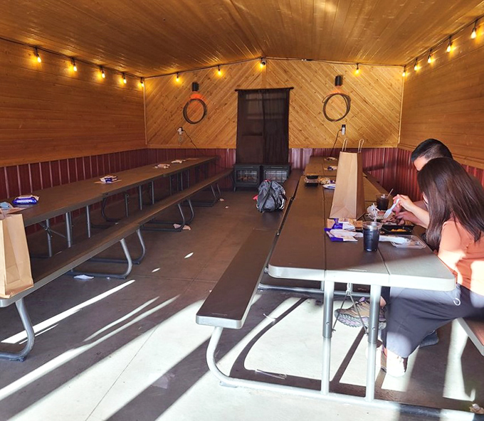 The dining area might be humble, but it's witnessed countless moments of BBQ-induced joy &ndash; string lights included at no extra charge.