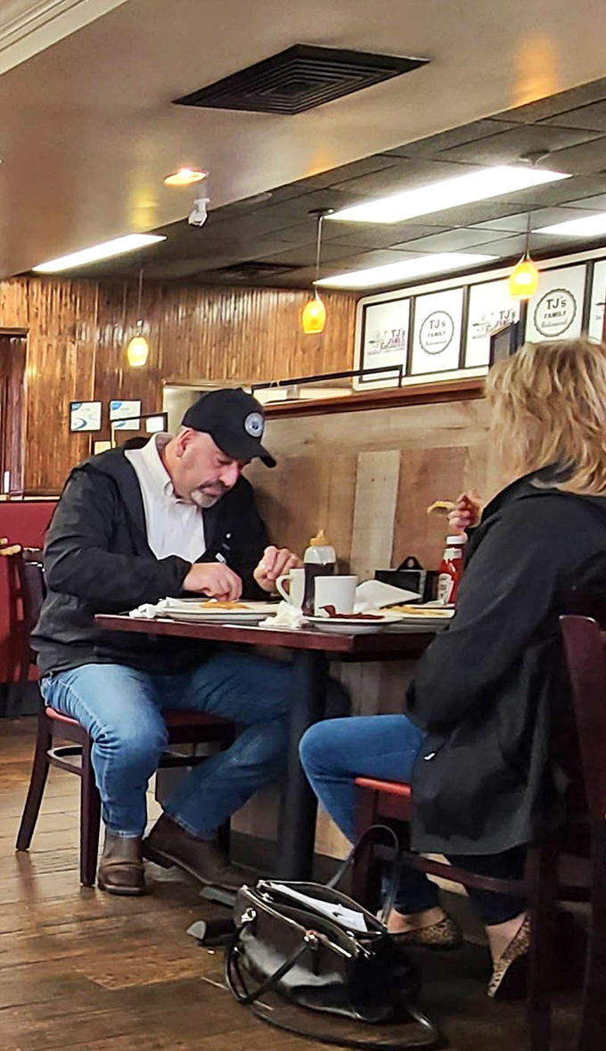 The true measure of a great restaurant: diners completely focused on their food, conversation temporarily paused for culinary appreciation.