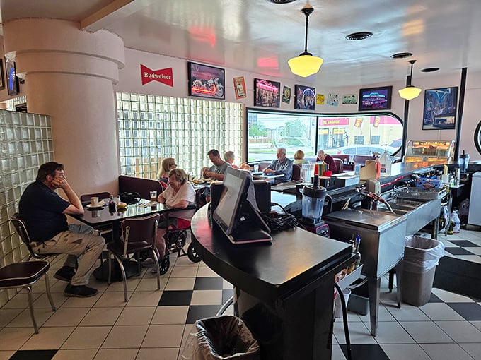 The counter and booths create that perfect diner symphony &ndash; the clink of forks, murmur of conversation, and occasional burst of laughter.