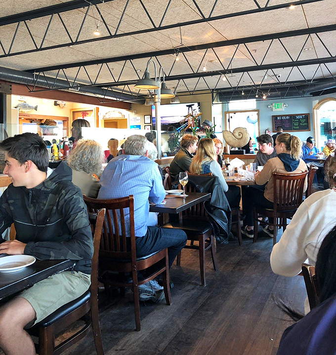 The bustling dining room hums with the universal language of "mmm" as strangers become united in seafood appreciation.