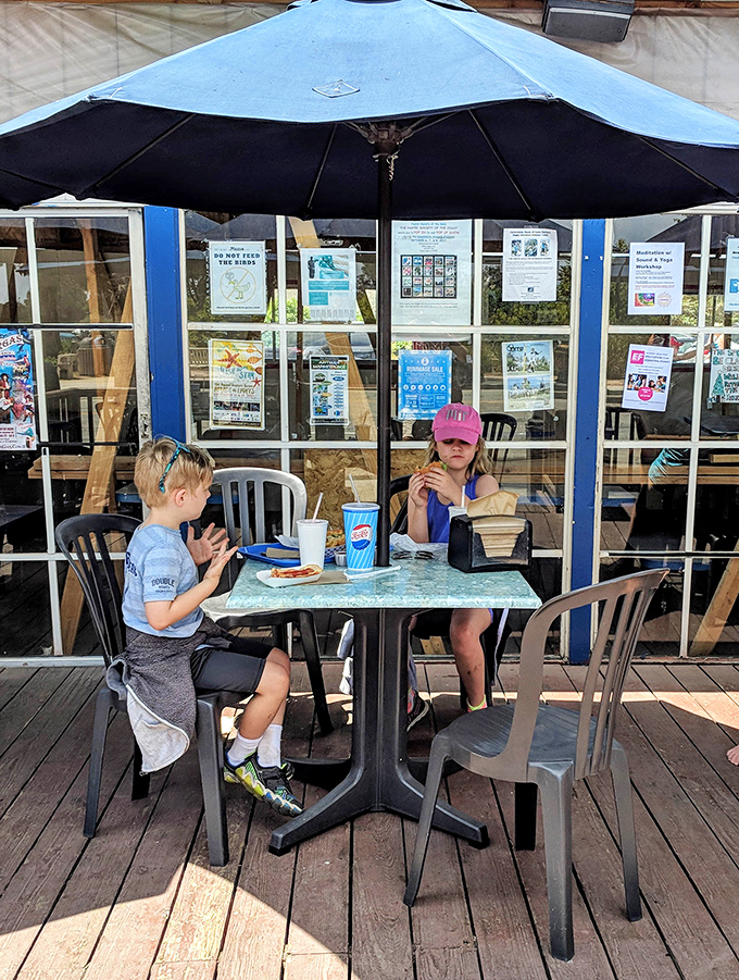 Family memories in the making – The Spot's outdoor tables have witnessed first bites, birthday celebrations, and the timeless joy of kids discovering the perfect french fry.