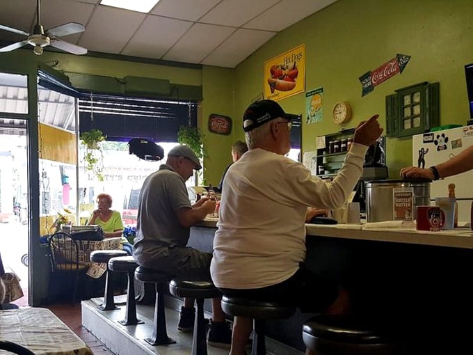 The counter seating: where solo diners become temporary neighbors and everyone's united by the universal language of "pass the syrup."