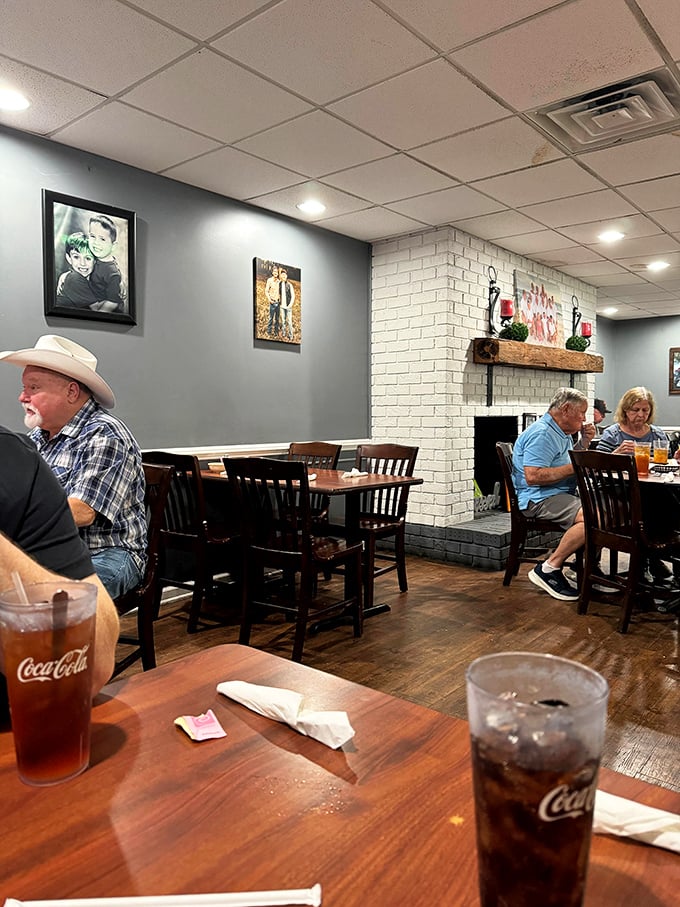 The dining room hums with conversation while Coca-Cola flows freely &ndash; the soundtrack and fuel of authentic Southern dining experiences.