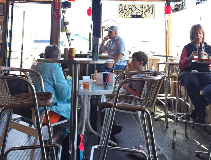 The best conversations happen over seafood. These diners know the secret to happiness is a table at Tony's and time to savor every bite.