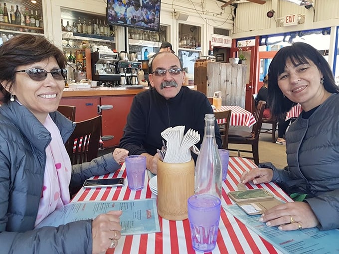 Happy faces around the table - the universal language of "we definitely ordered the right thing tonight."