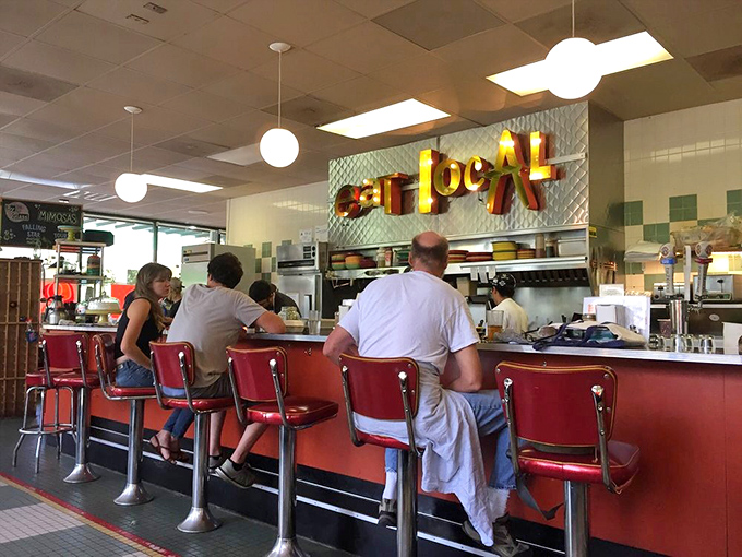 The counter seating offers front-row tickets to the breakfast show, where regulars and first-timers share the universal language of good food.