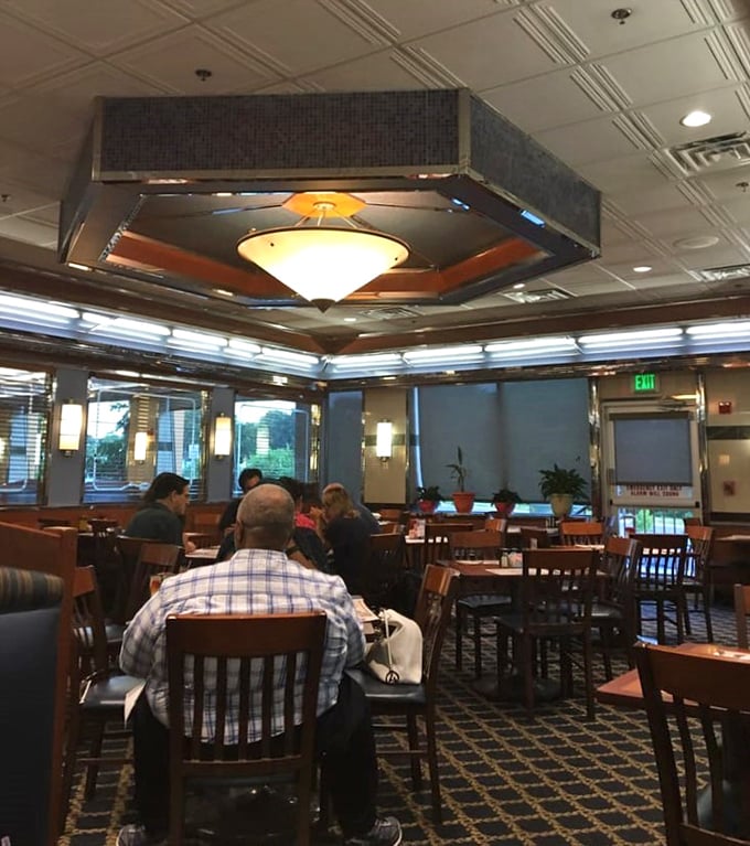 The dining room buzzes with conversation and clinking silverware&mdash;the soundtrack of community happening between bites of comfort food.