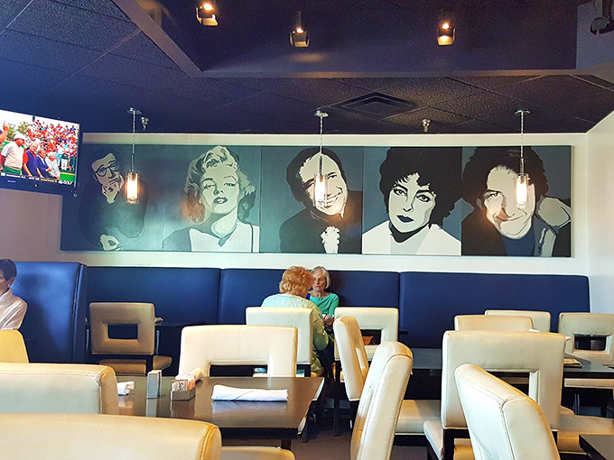 The wall art featuring iconic faces watches over diners enjoying their meals&mdash;it's like eating with celebrities, minus the paparazzi.