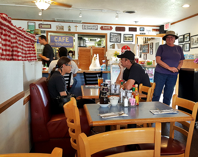 Where locals gather to solve the world's problems over endless coffee refills. Some friendships here are older than the vintage signs on the wall.