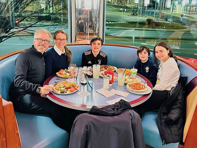 The circular booths aren't just comfortable&mdash;they're conversation incubators where family memories are made between bites of perfect diner fare.