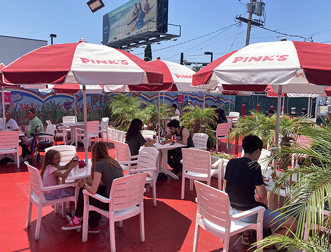 The outdoor patio at Pink's: where strangers become friends united by the universal language of "I can't believe I ate the whole thing."