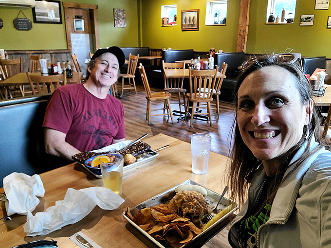 The universal language of barbecue satisfaction written clearly on these diners' faces. Some moments are worth documenting between bites.