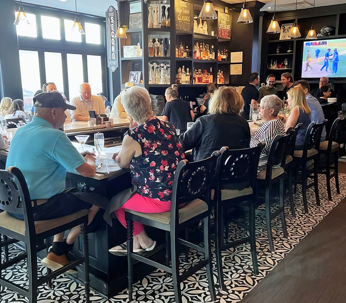 The bar area buzzes with the happy hum of people making memories over martinis. Notice how nobody's looking at their phones? That's the magic of great food.