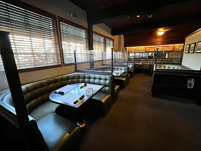 Booth seating that invites you to settle in for the long haul. These aren't "rush you out" tables; they're "take your time, have another rib" tables.