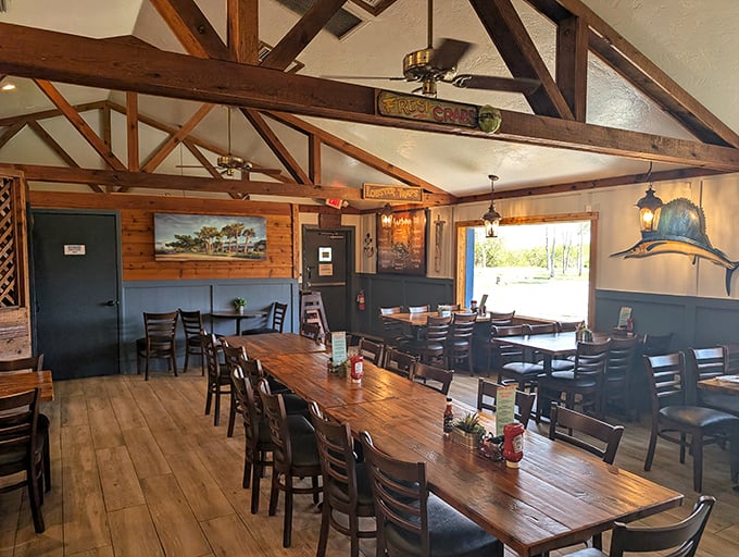 Rustic wooden beams, community tables, and nautical touches create the perfect backdrop for seafood storytelling. Every scratch in that wood has a tale to tell.