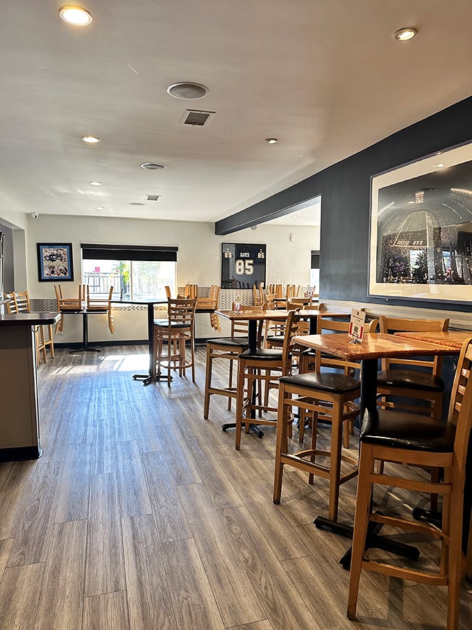 High-top tables, sports memorabilia, and wooden chairs that say "we care more about our smoker than our furniture"&mdash;as it should be.