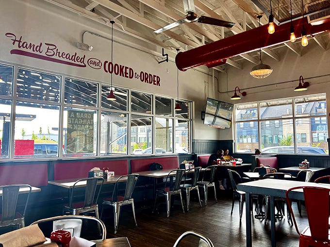 "Hand Breaded and Cooked to Order" isn't just wall decoration&mdash;it's the restaurant's mission statement spelled out above diners enjoying the fruits of that promise.