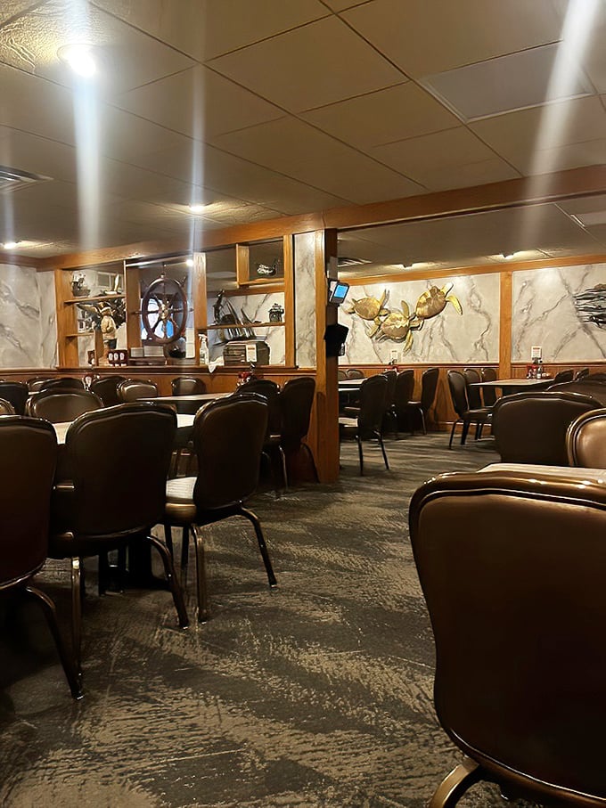 The dining area's nautical touches and warm wood tones create an atmosphere that says, "Stay awhile, the outside world can wait."