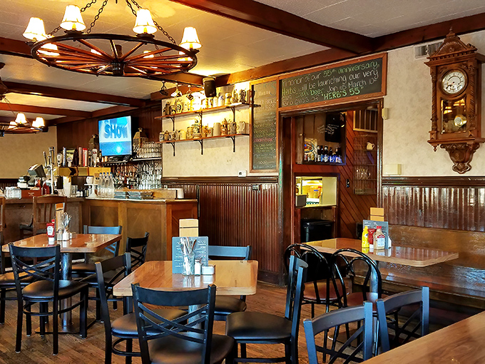 Wagon wheel chandeliers and wood paneling create the perfect backdrop for stories that get better with each telling.