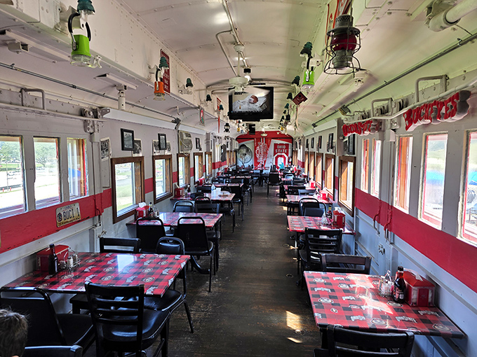 The full dining car experience&mdash;narrow, nostalgic, and perfectly preserved. Those red-checkered tablecloths aren't just decoration; they're time machines to simpler days.