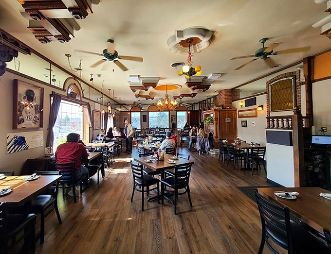 Wooden beams, warm lighting, and tables spaced for conversation—this dining room feels like the Pennsylvania version of "Cheers."