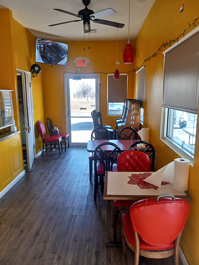 The narrow dining room feels like someone's cheerful kitchen, where strangers become friends over the universal language of "pass the sauce."