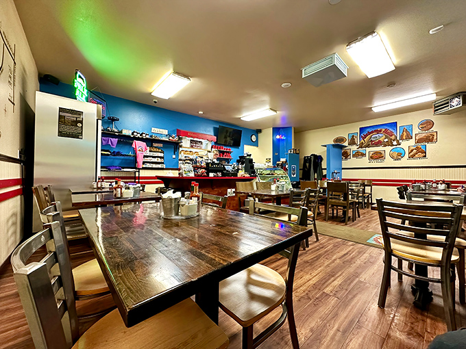 The dining area's wood-paneled charm feels like you've stepped into a mountain cabin where calories don't count and coffee refills are mandatory.