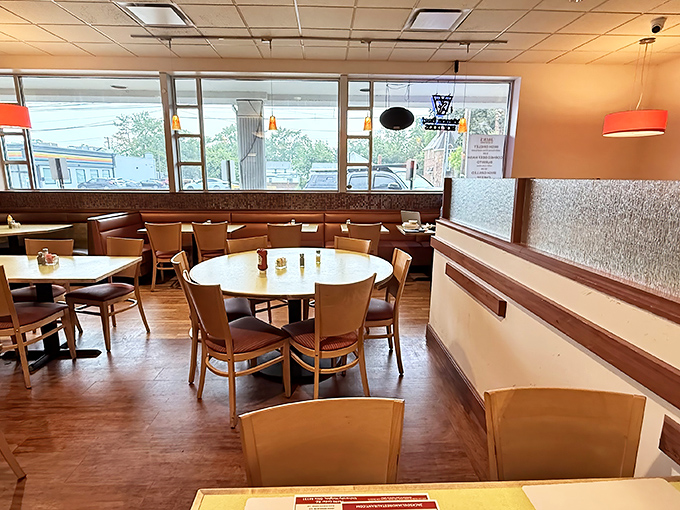 The dining area's round tables encourage conversation while the booths along the wall offer the perfect spot for people-watching or serious eating.
