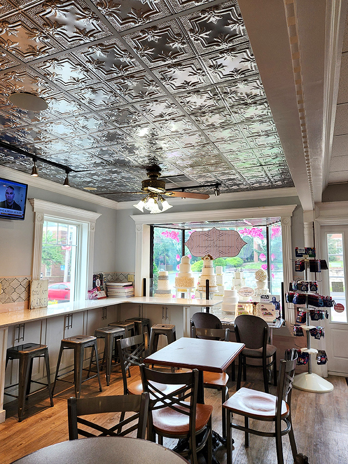 A dining area with tin ceilings that make you feel fancy while devouring a cupcake.