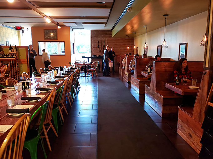 The dining area balances rustic charm with comfortable seating&mdash;exactly where you want to linger over that last bite of pasta.