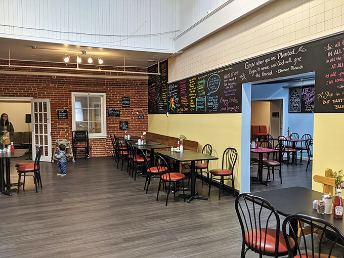 String lights crisscross above simple tables, creating the kind of unpretentious charm that makes you want to linger over just one more bite.