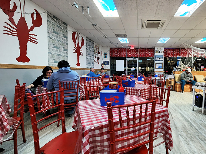 Red checkered tablecloths and lobster wall art create that perfect "I've discovered a hidden gem" atmosphere that makes you feel like a local.