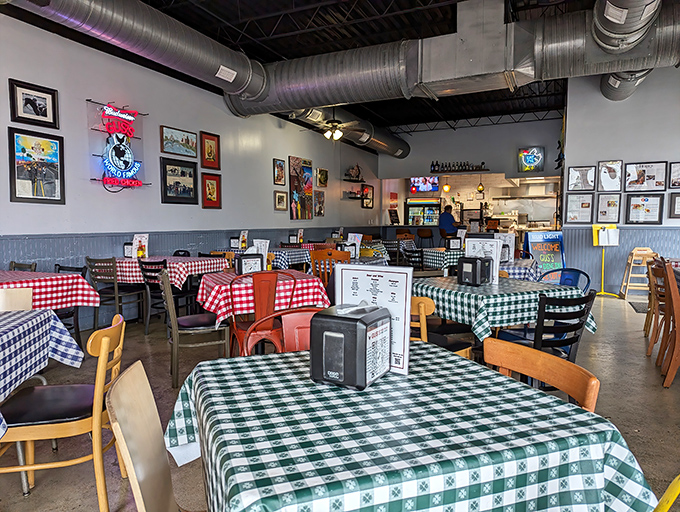 Checkered tablecloths and simple chairs say, "We put our effort into the food, not the furniture." Smart priorities.