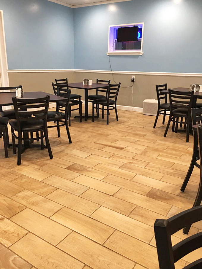 The dining room keeps it real with a calming blue palette – because when the food is this good, you don't need fancy chandeliers.